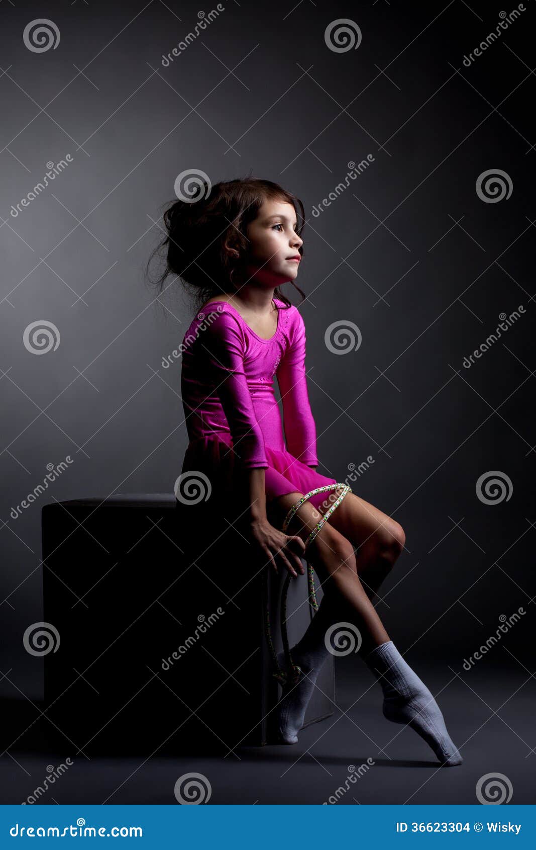 Sad Artistic Gymnast Sitting on Cube with Rope Stock Photo - Image of ...