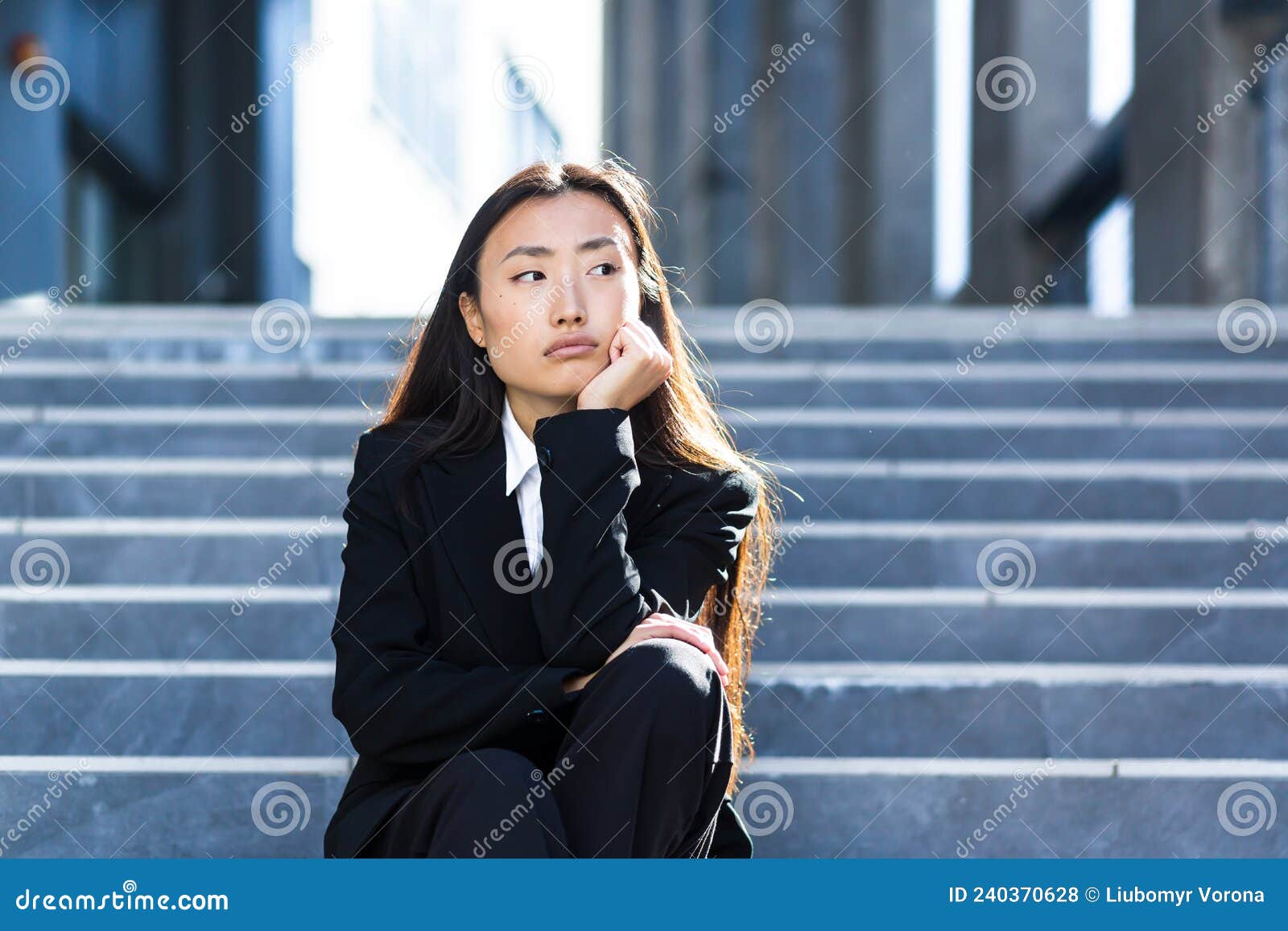 Sad Asian Woman Fired from Work Sitting on the Stairs Stock Photo ...