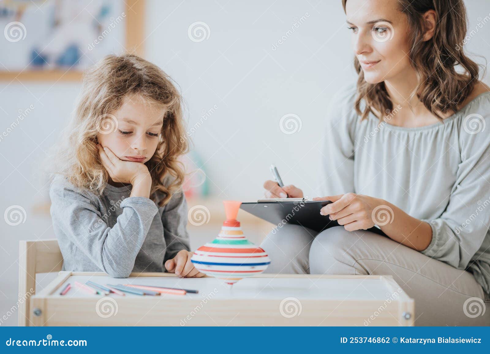 Sad autistic boy stock photo. Image of sitting, treatment - 253746862