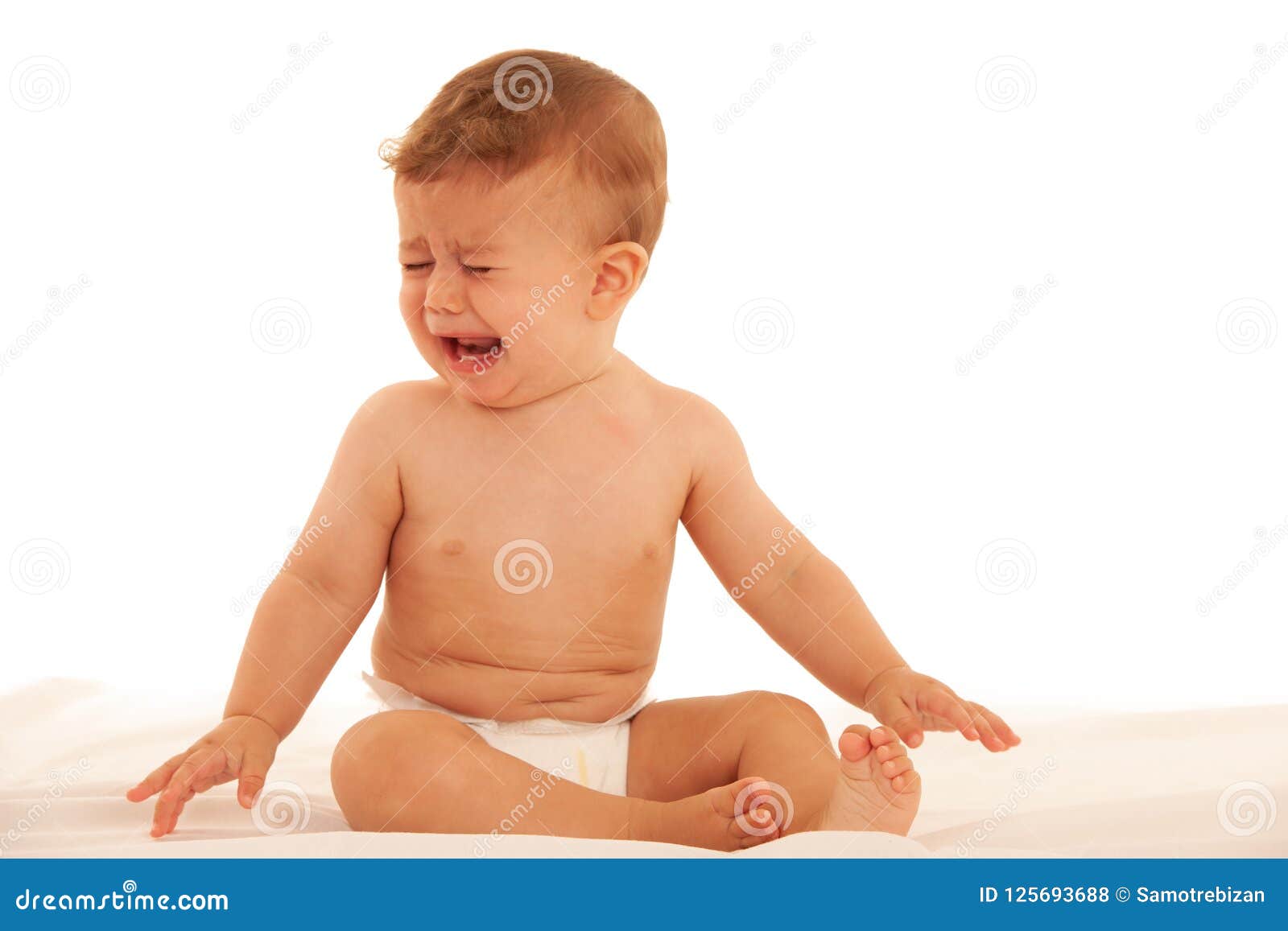 Sad Baby Boy in Crying on Bed Over White Stock Photo - Image of studio ...