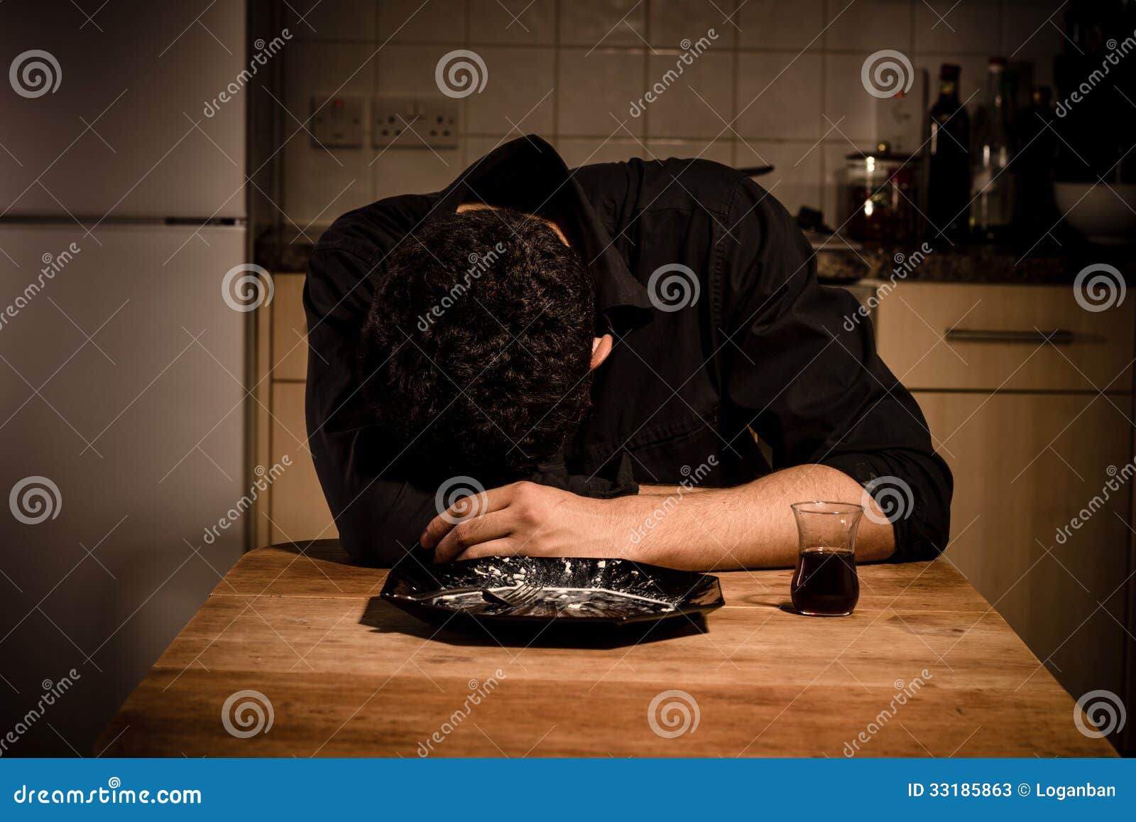 Sad bachelor eating alone stock image. Image of people - 33185863