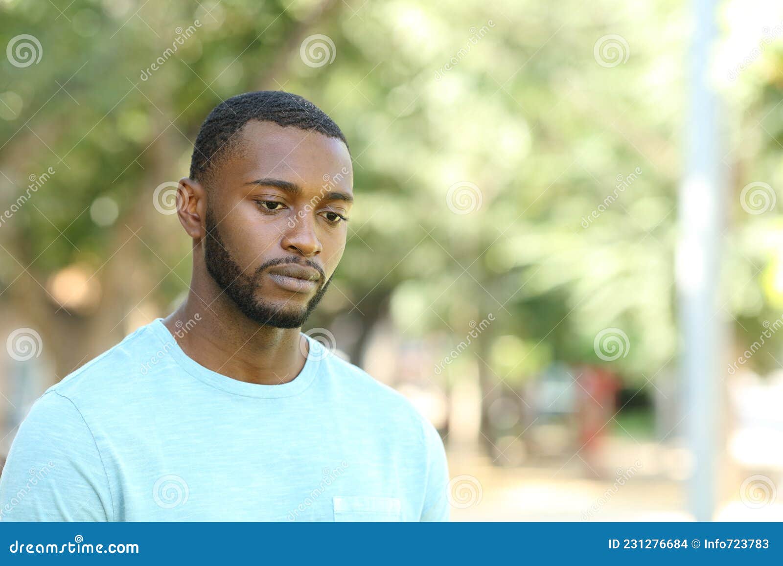 Sad Black Man Looking Away in a Park Stock Photo - Image of afro ...