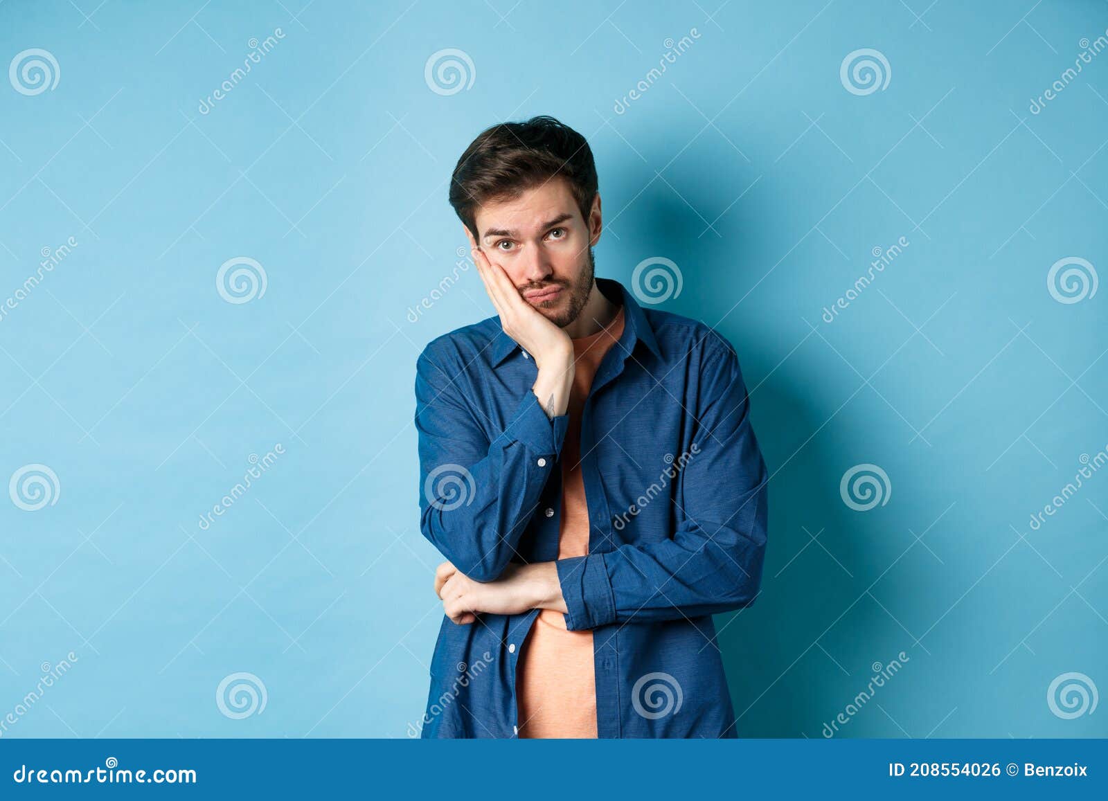 Sad and Bored Man Lean Face on Hand, Looking at Camera Empty-headed ...