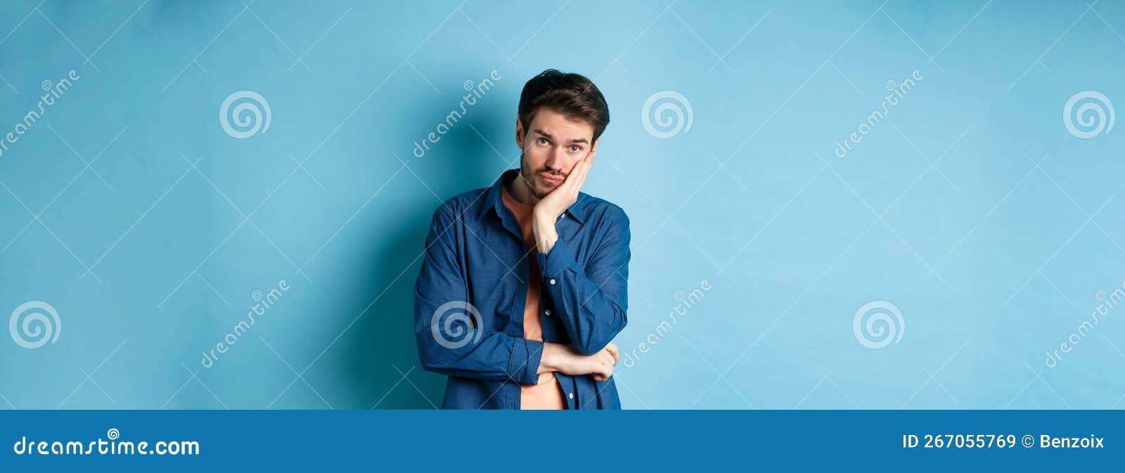 Sad and Bored Man Lean Face on Hand, Looking at Camera Empty-headed ...