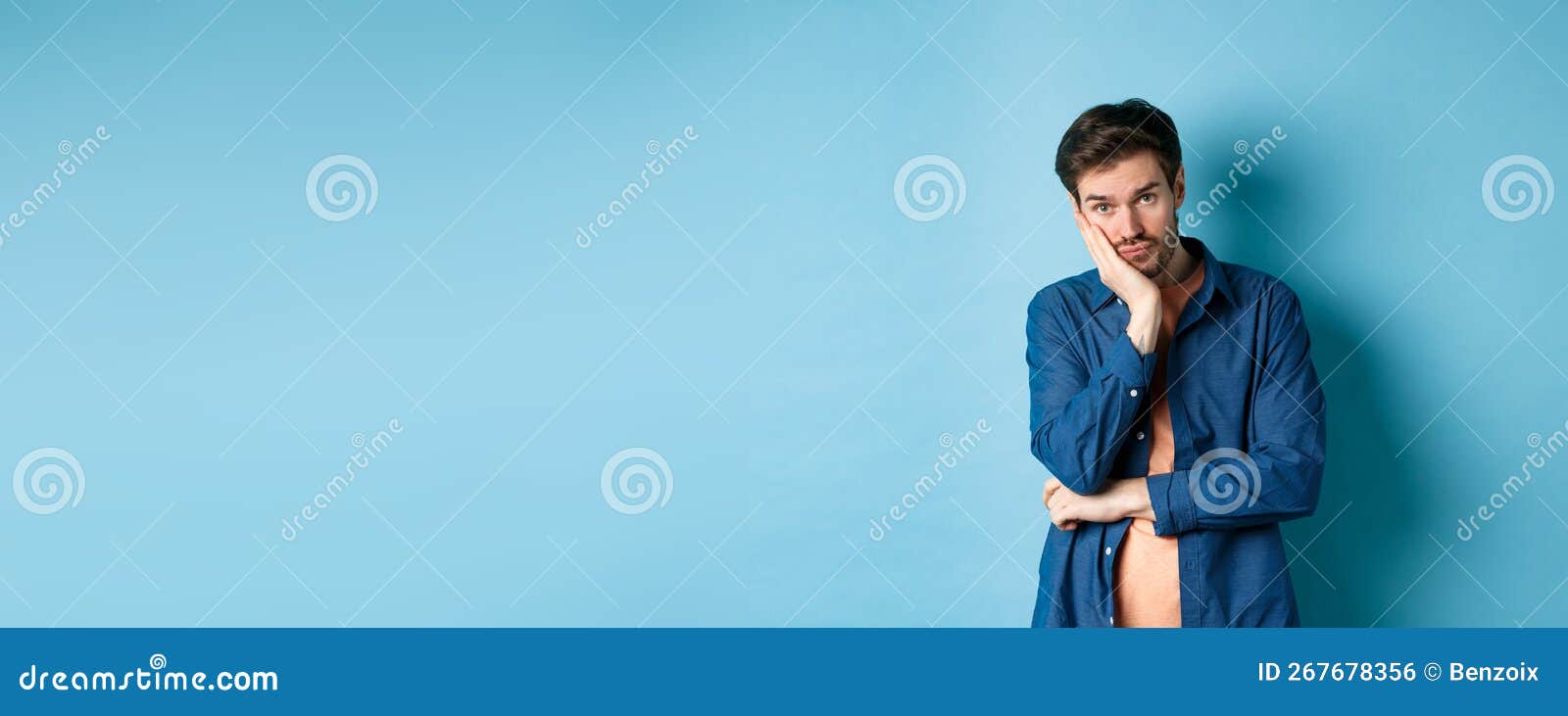 Sad and Bored Man Lean Face on Hand, Looking at Camera Empty-headed ...