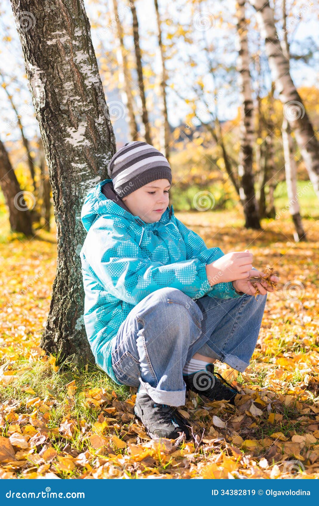 Sad boy in autumn park stock image. Image of jacket, cheerless - 34382819