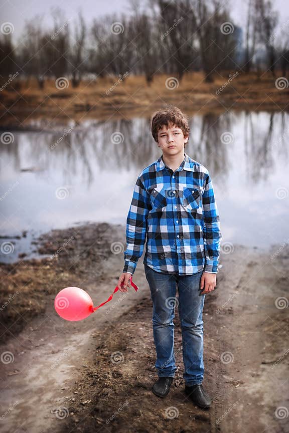 The sad boy with a balloon stock image. Image of outdoors - 30688235