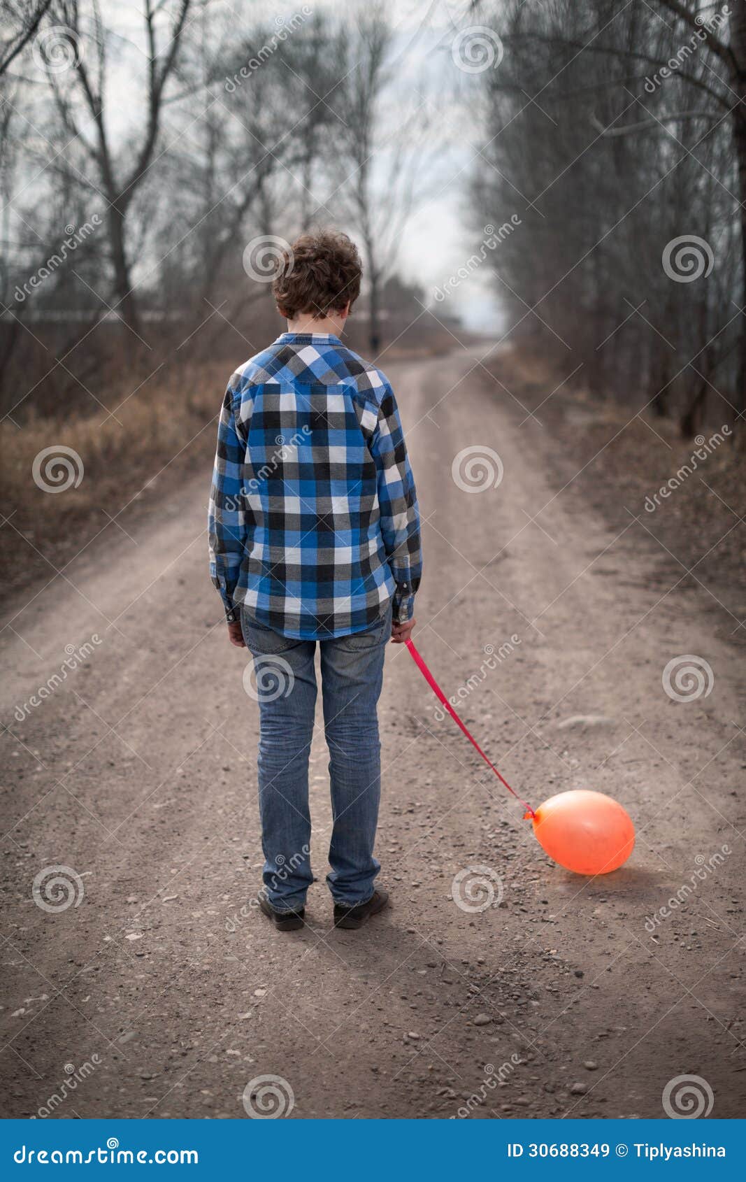 The sad boy with a balloon stock image. Image of pensive - 30688349