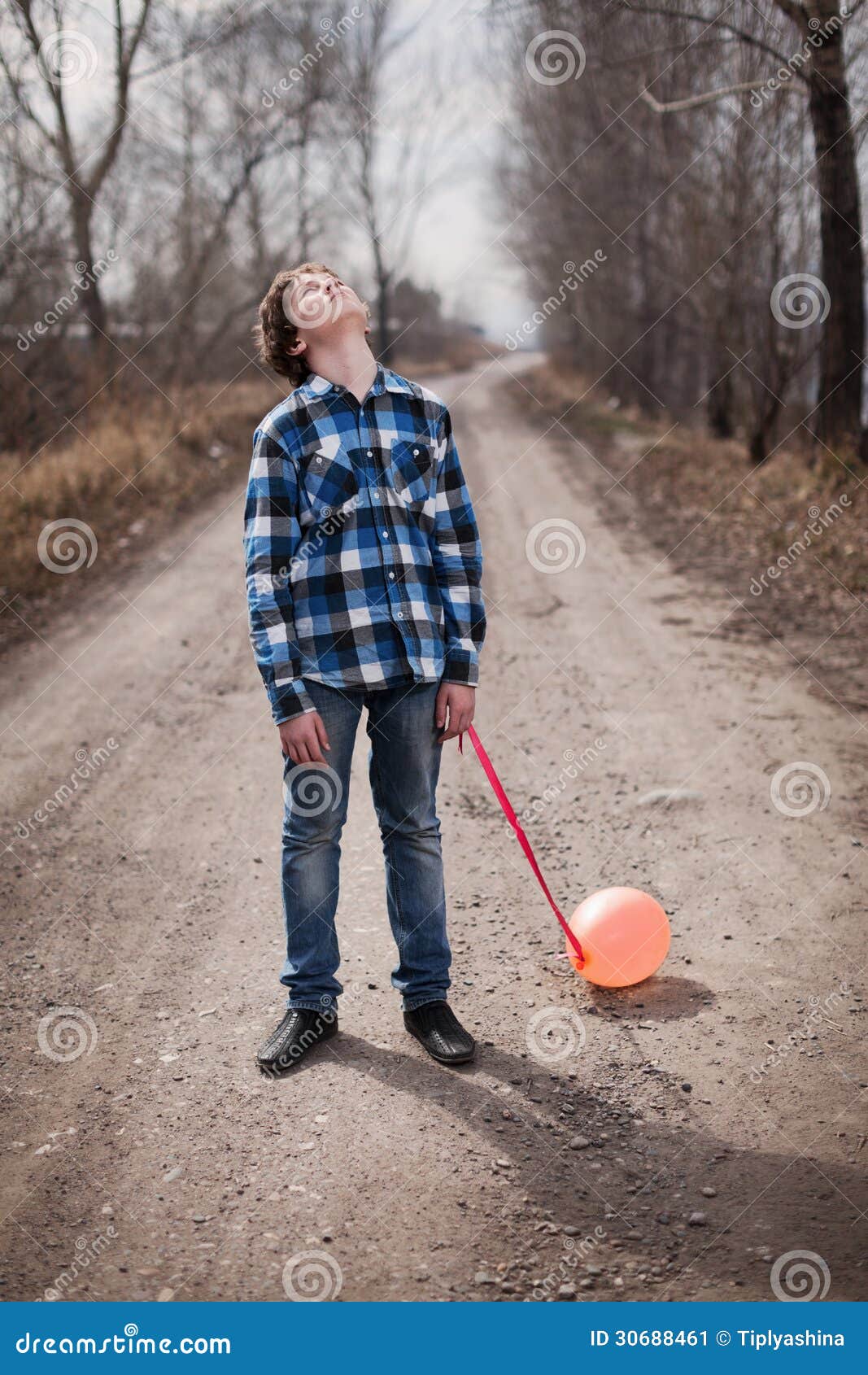 The sad boy with a balloon stock image. Image of simple - 30688461