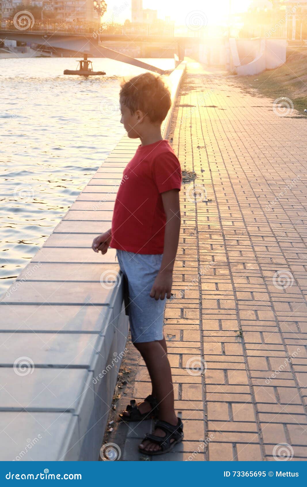 Sad Boy Portrait on Embankment Backlit, Toned Image Stock Image - Image ...