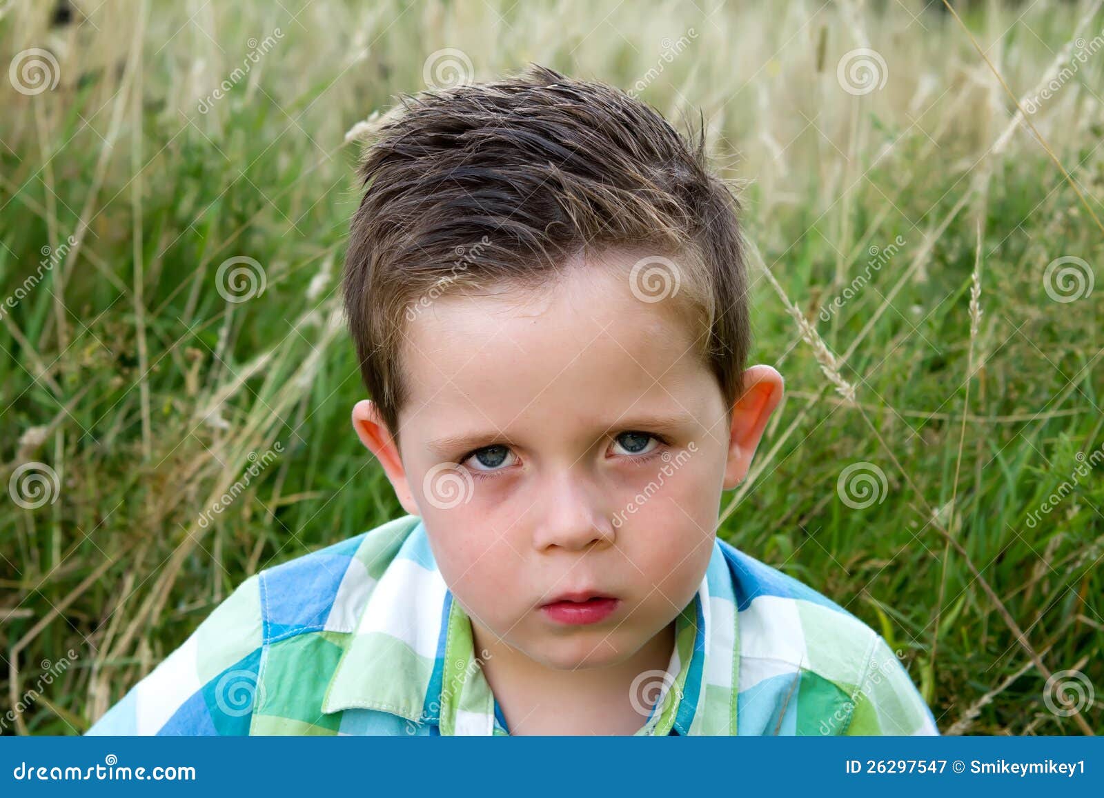 Sad Boy Scowling Whilst Looking Ahead Stock Image - Image of pressure ...