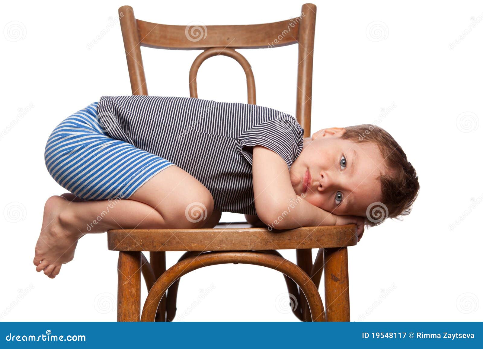 Sad boy sitting on chair stock image. Image of sadness - 19548117