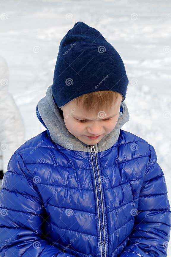 The sad boy on snow stock photo. Image of snow, grief - 80260244