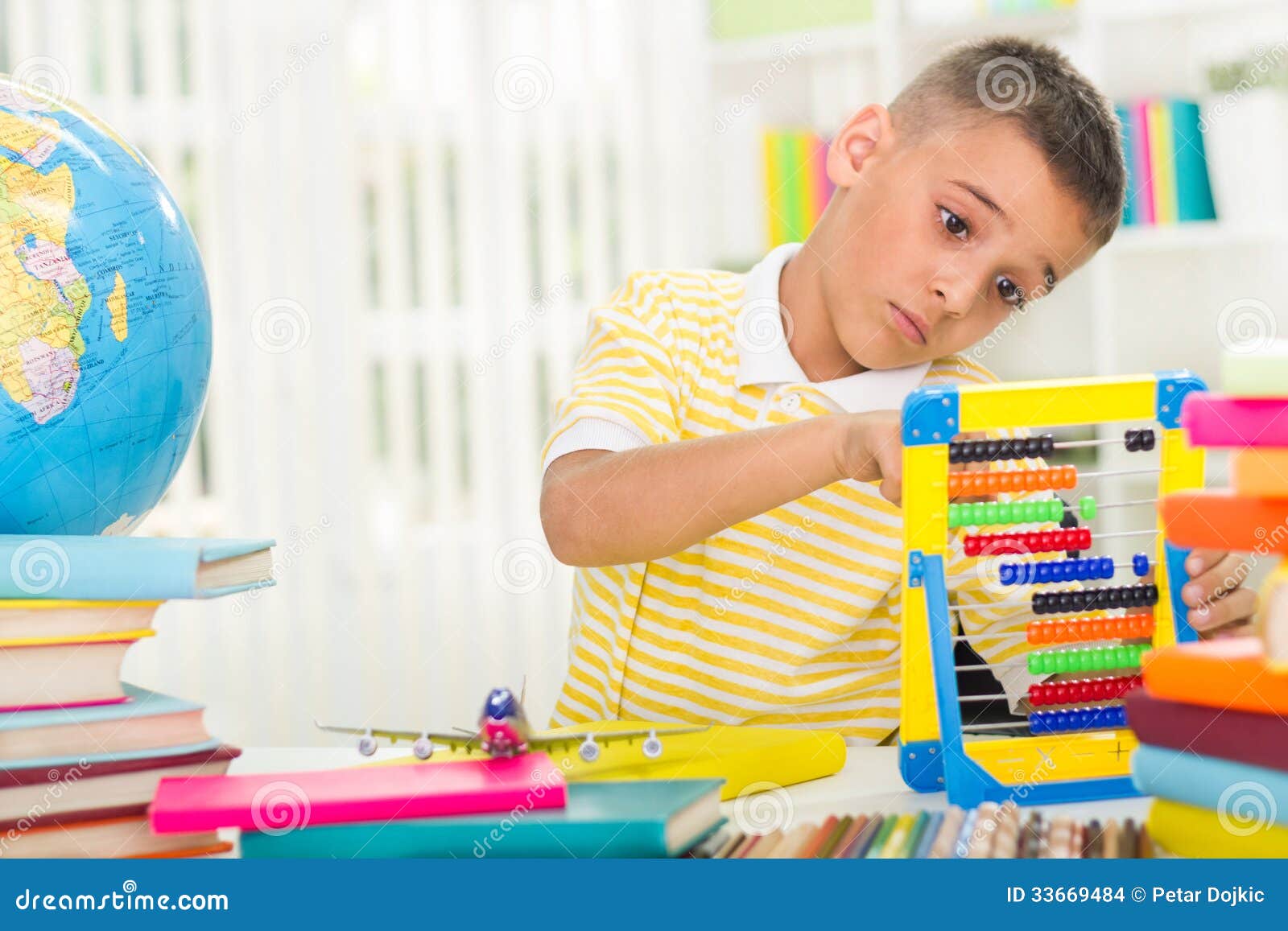 Sad Boy Studyng for Written Assignment Stock Photo - Image of childhood ...