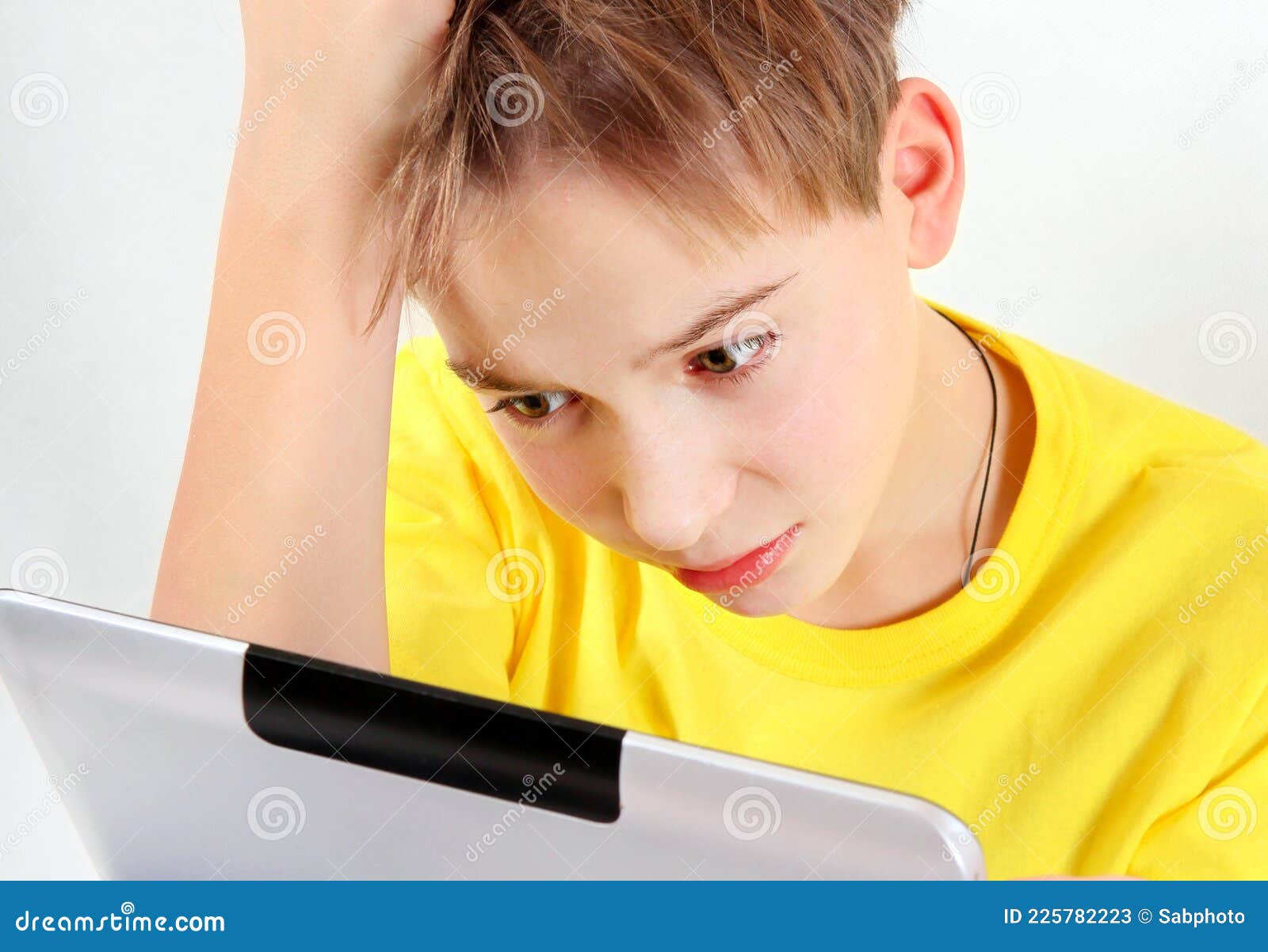 Sad Boy with a Tablet stock image. Image of child, room - 225782223