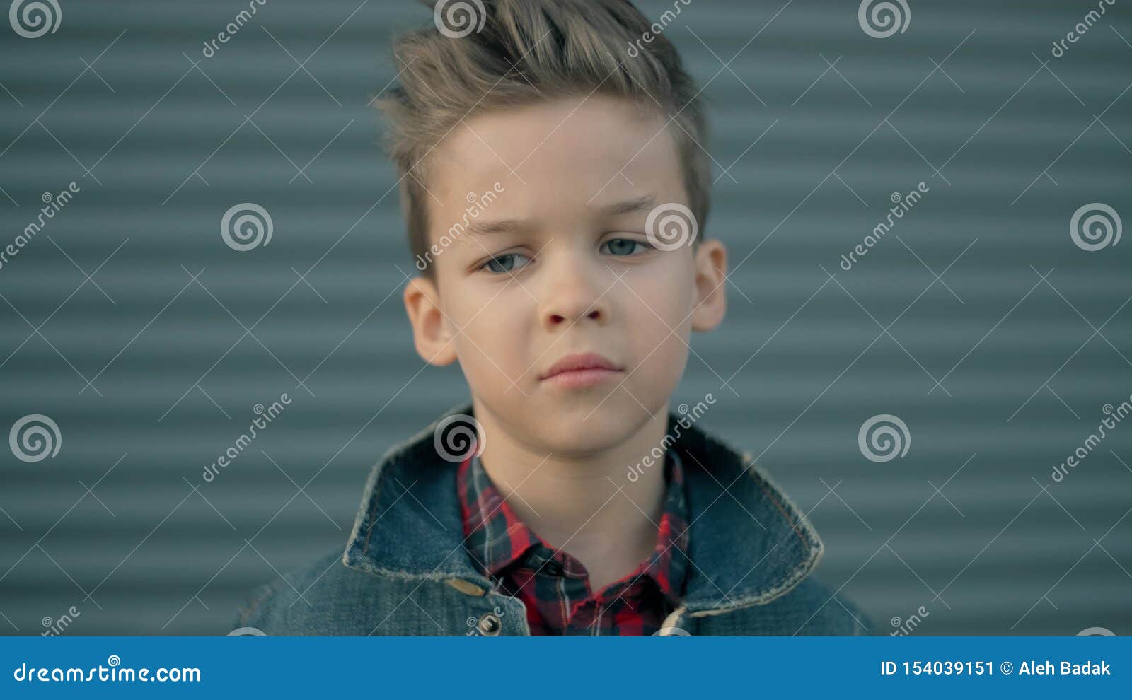 Sad Boy is Thinking and Looking at the Camera. Face of a Little Serious ...