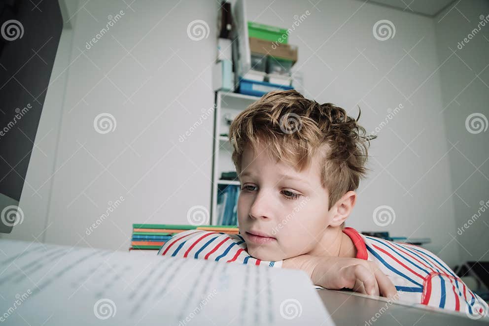 Sad Boy Tired and Stressed of Reading, Doing Homework Stock Photo ...