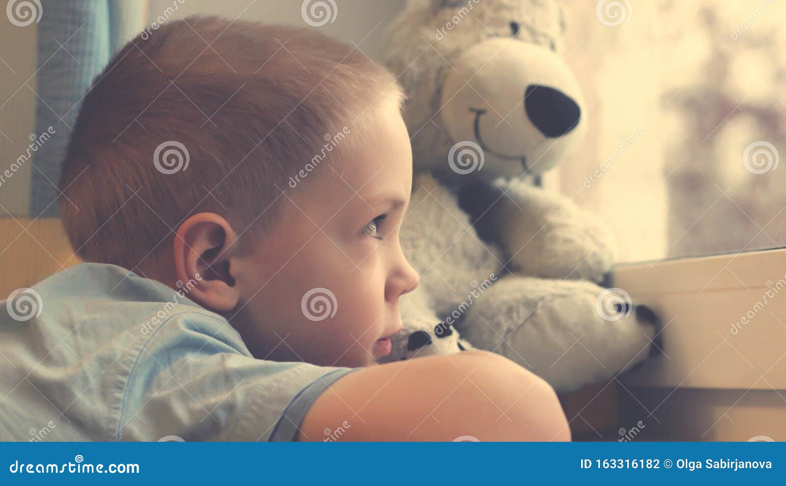 Sad Boy at the Window and Bear Toy, Loneliness and Depression Stock ...