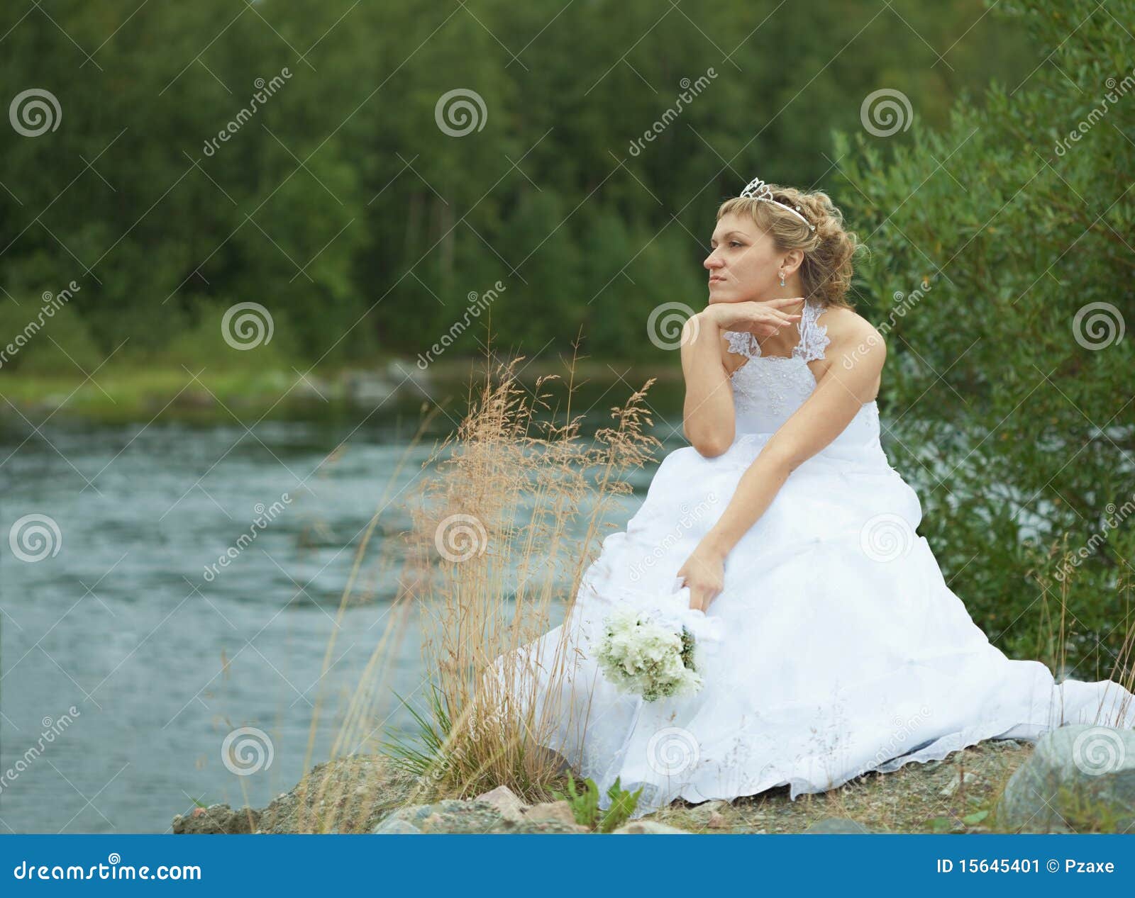 Sad Bride Sits on River Bank Stock Image - Image of dress, flowers ...