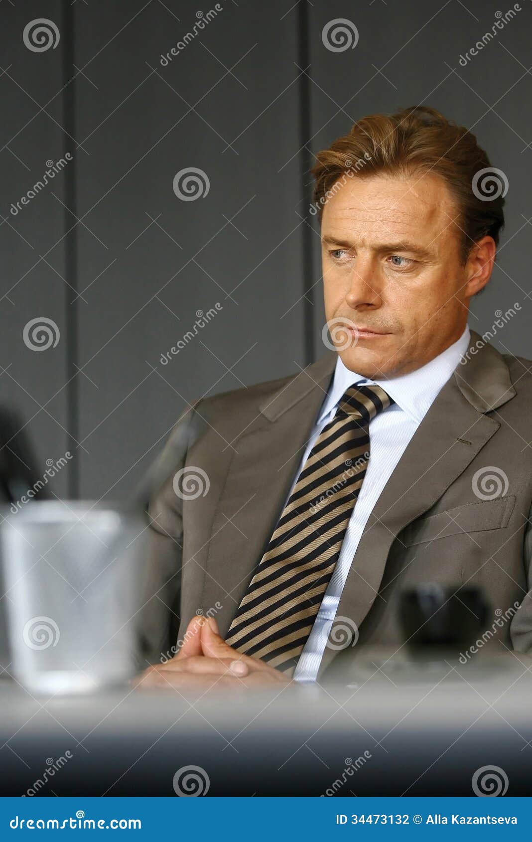 Sad businessman in office stock photo. Image of expression - 34473132