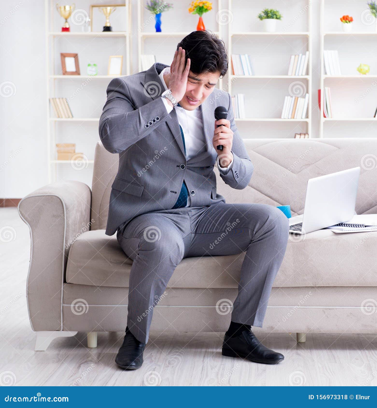Sad Businessman Singing in Office Stock Photo - Image of christmas ...