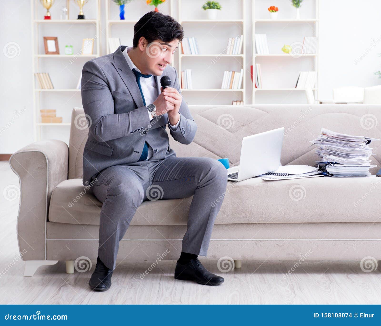 Sad Businessman Singing in Office Stock Photo - Image of service ...