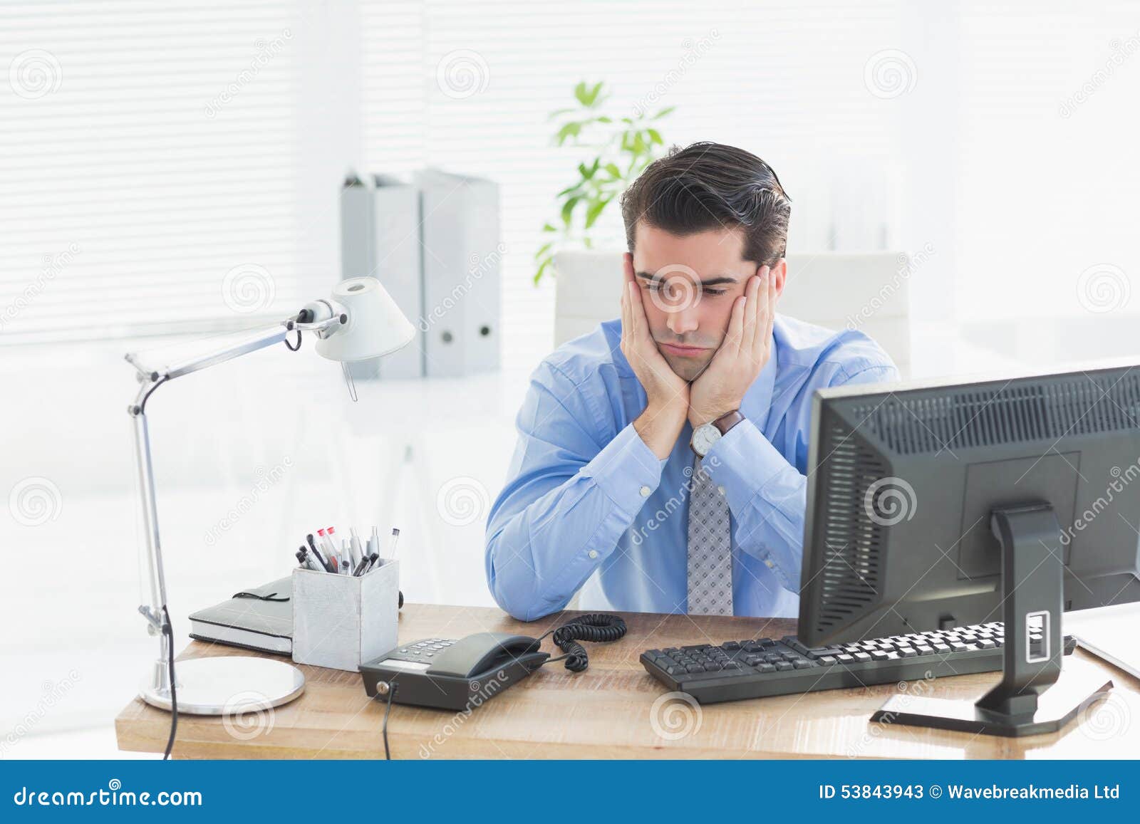 Sad Businessman Sitting at His Desk Stock Image - Image of male, land ...