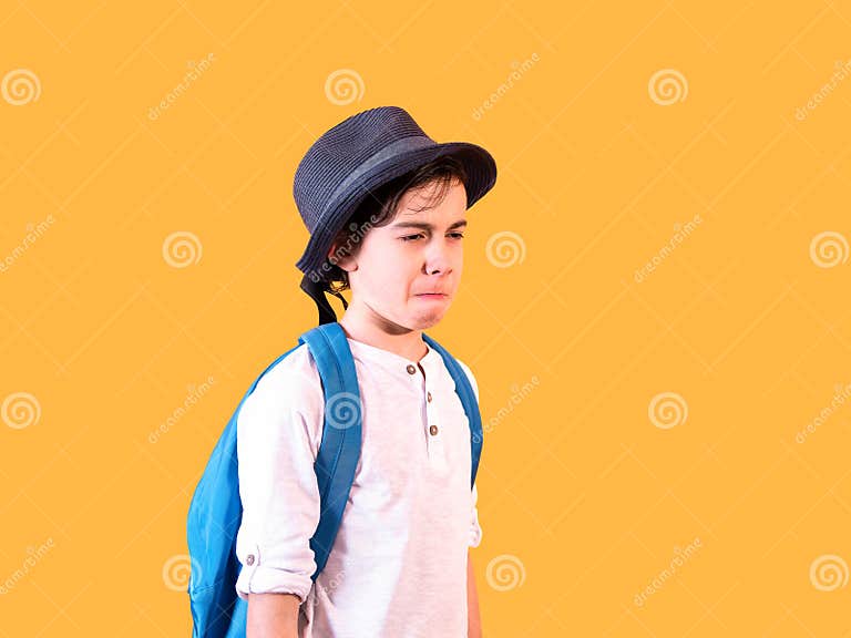 Sad Child with Backpack on Orange Background Stock Image - Image of ...