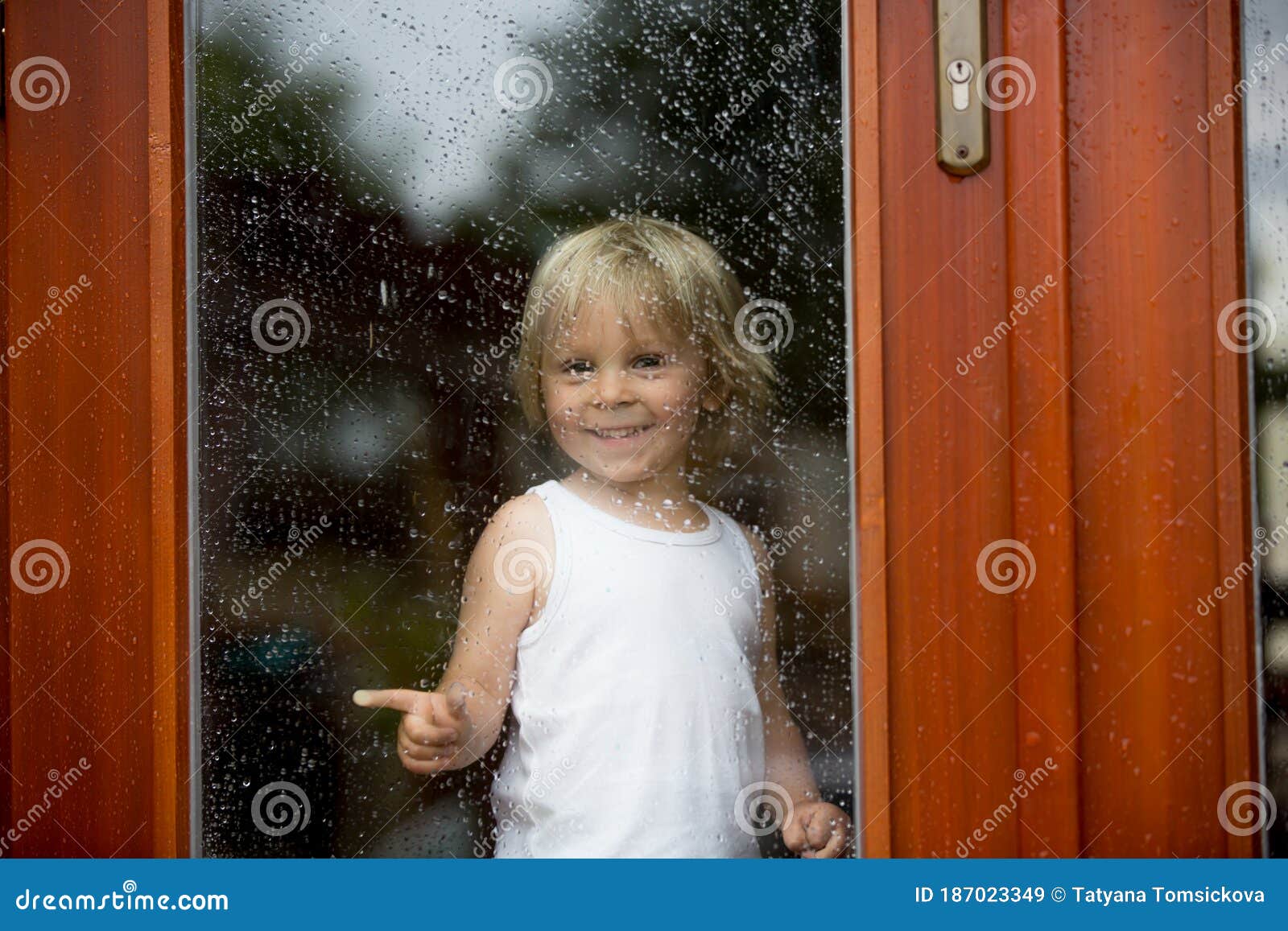 Sad Child Behind the Window on Rainy Day Stock Image - Image of rain ...