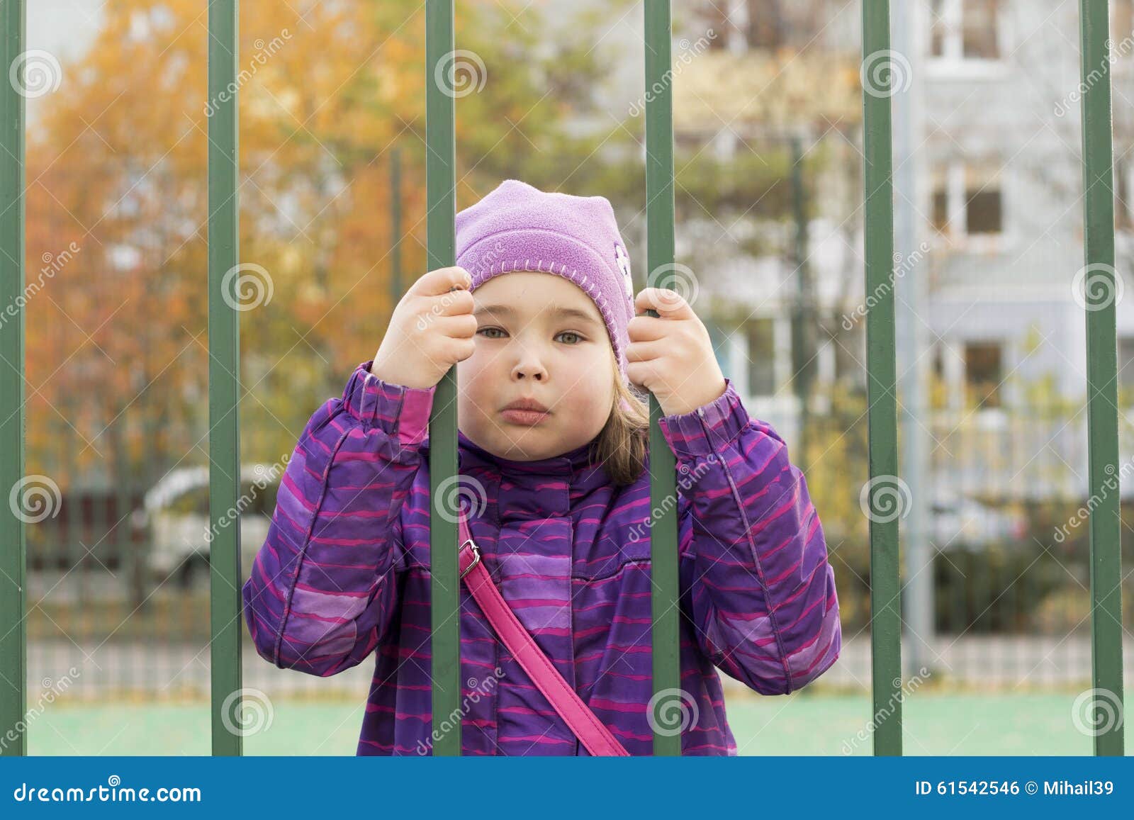 Sad child in jail stock photo. Image of waiting, purple - 61542546