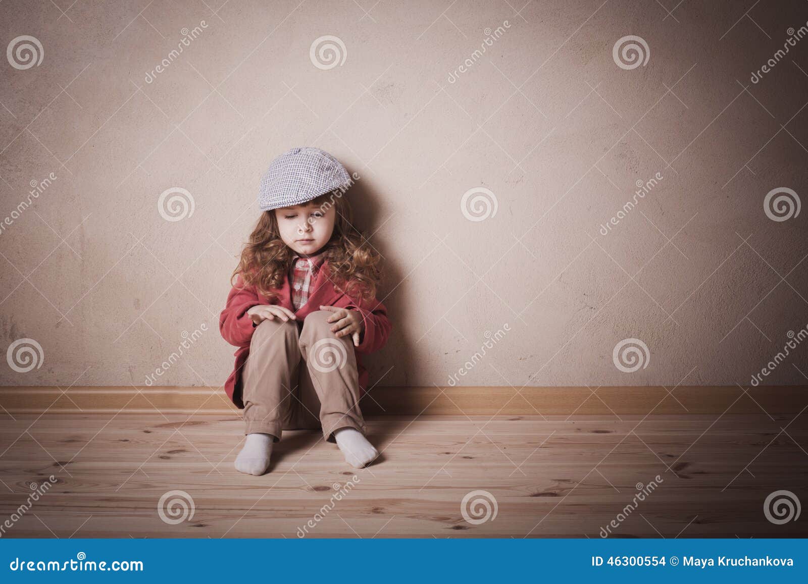 Sad Child Sitting on the Floor Stock Photo - Image of background ...