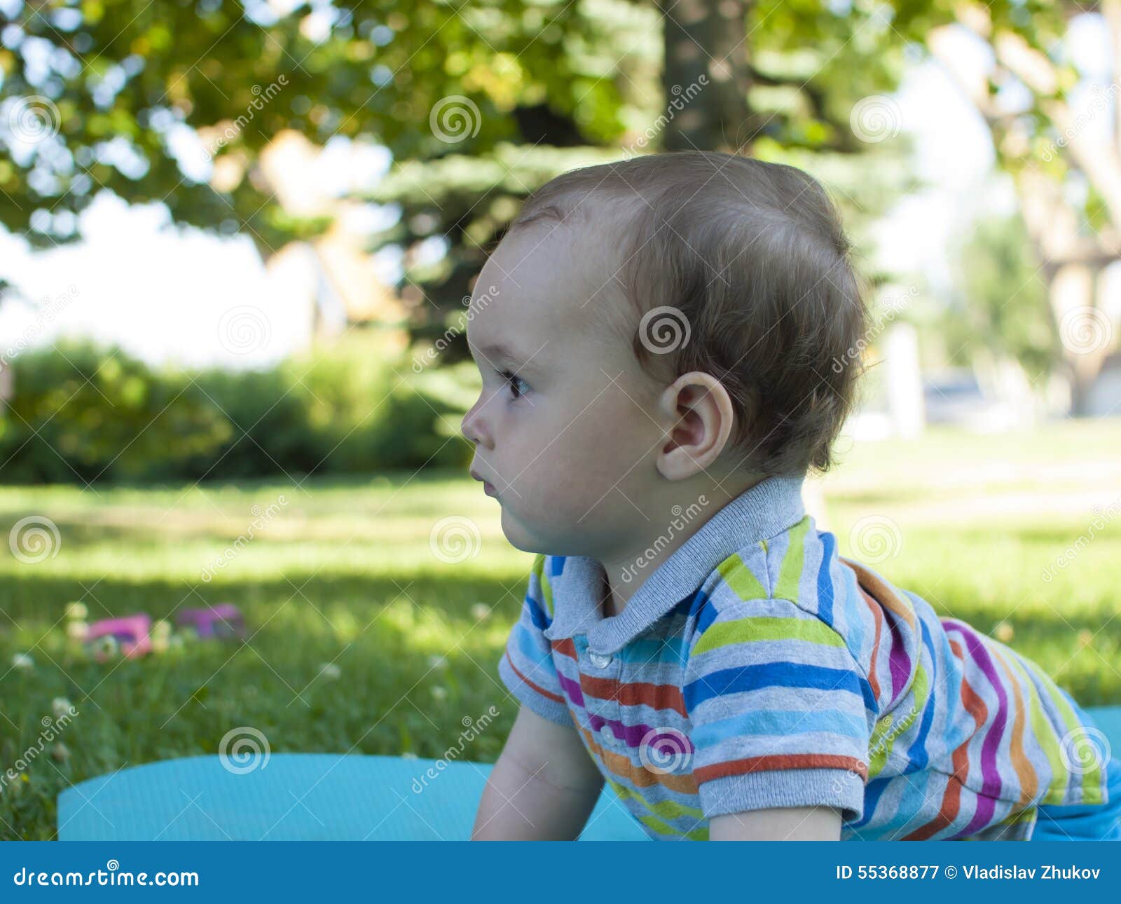 Sad Child Sitting on the Green Grass . Stock Image - Image of camping ...