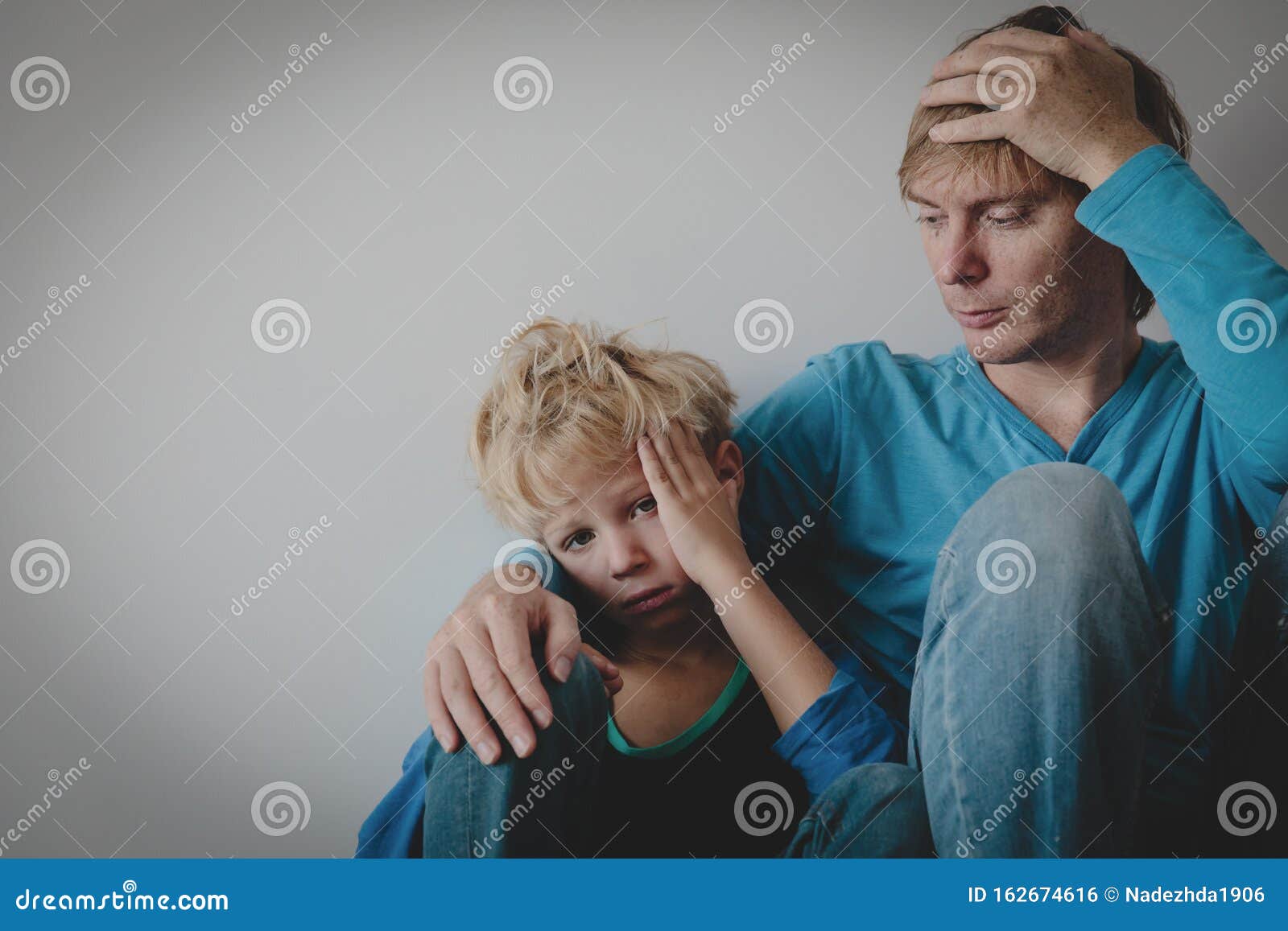 Sad Child with Stressed Father, Family Problems, Sorrow Stock Photo ...