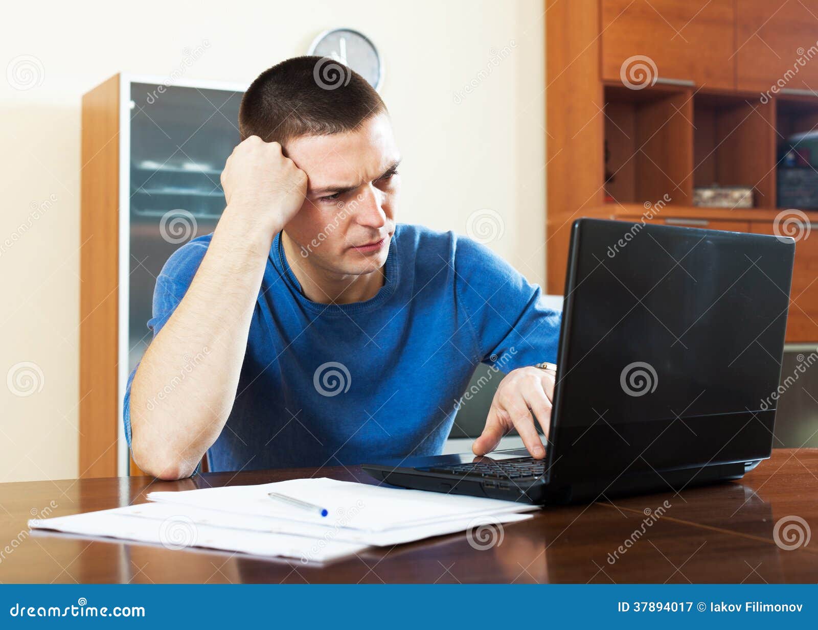 Sad Confused Man Looking at Laptop Stock Image - Image of calculating ...