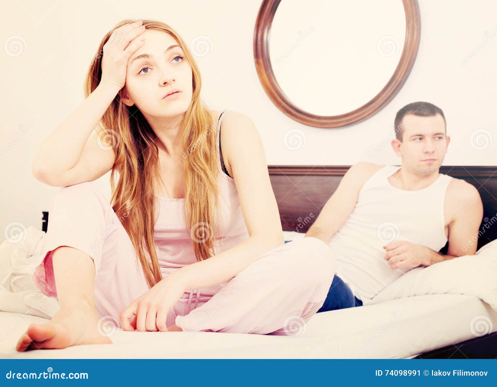 Sad couple in bed stock image. Image of female, nervous - 74098991