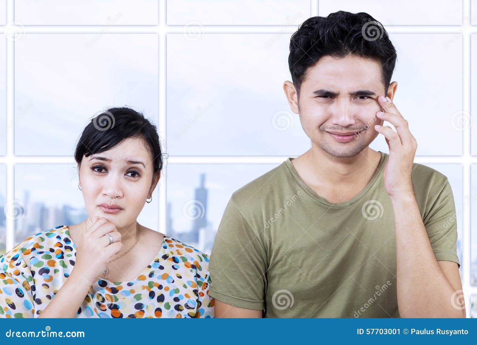 Sad Couple Expression in Apartment Stock Image - Image of face, blur ...