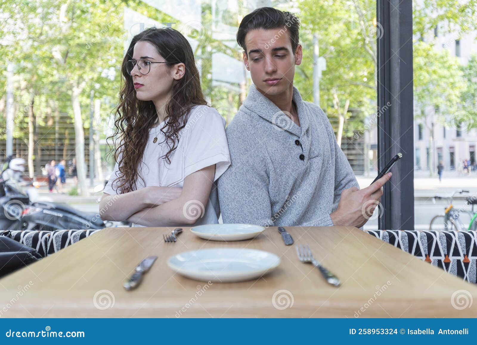 Young Woman Making an Exasperated Expression Gesture on a Bad Date at ...