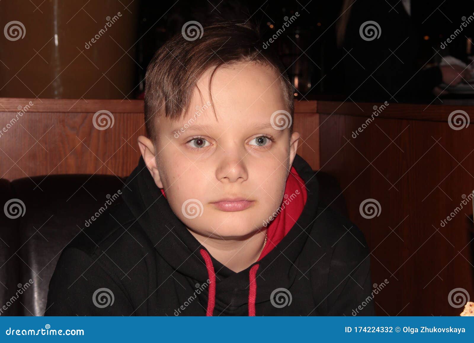 Sad, Cute Teenager. Brooding Boy on a Dark Background Stock Photo ...