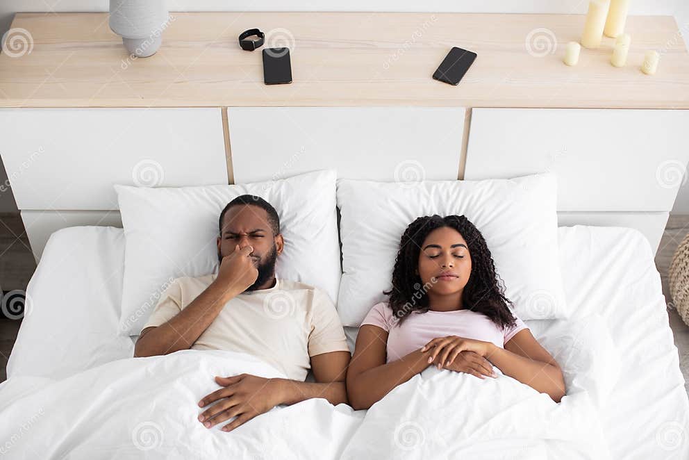 Sad Disgruntled Millennial African American Husband Closes Nose From