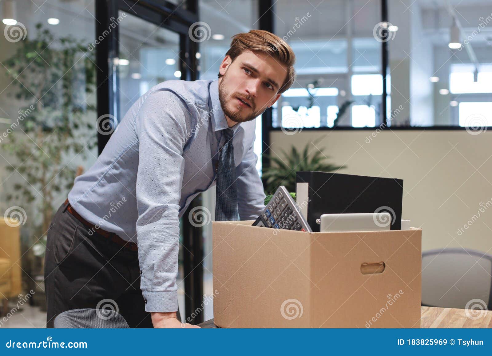 Sad Dismissed Worker are Taking His Office Supplies with Him from ...