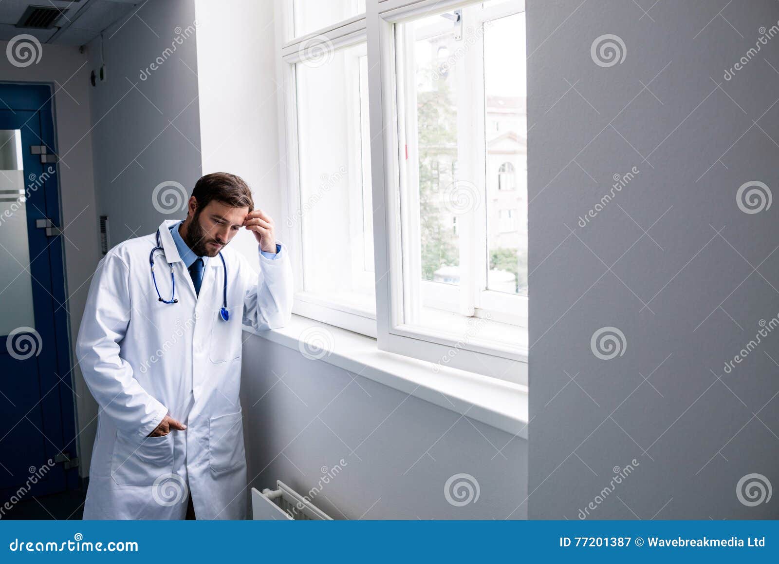 Sad Doctor Standing in Corridor Stock Image - Image of occupation ...