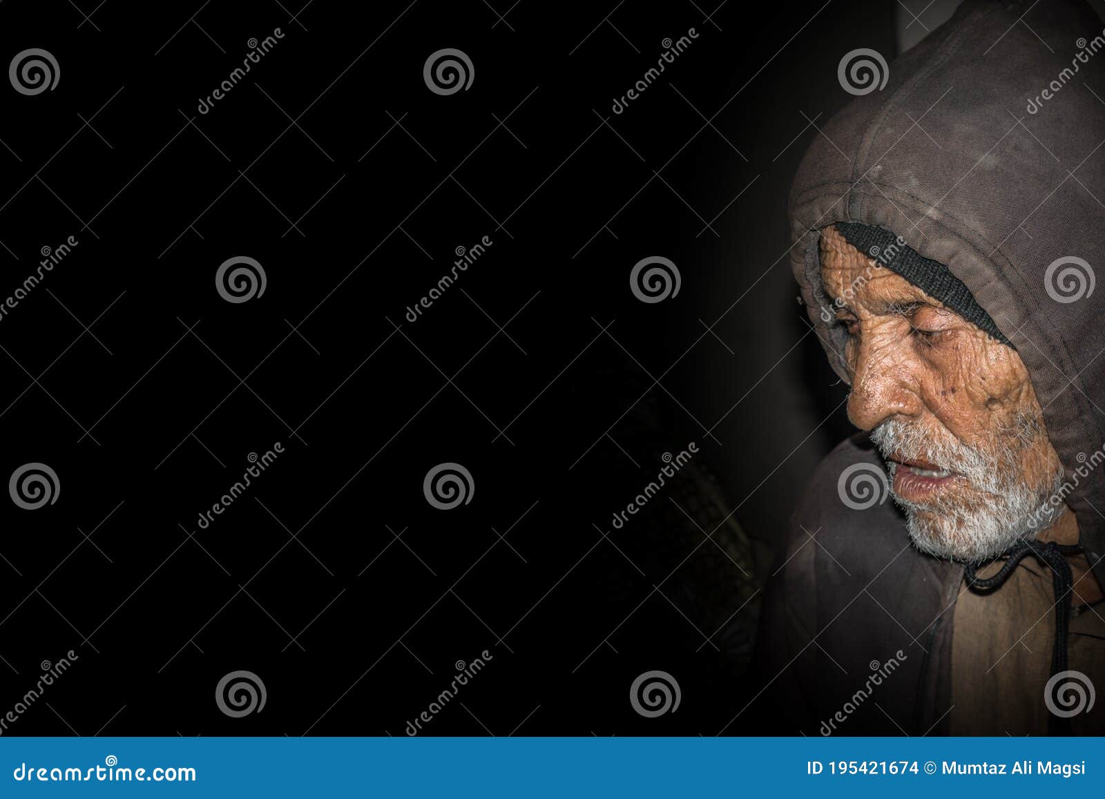 Sad Expression of an Elderly Sick Man in a Dark Room Stock Photo ...
