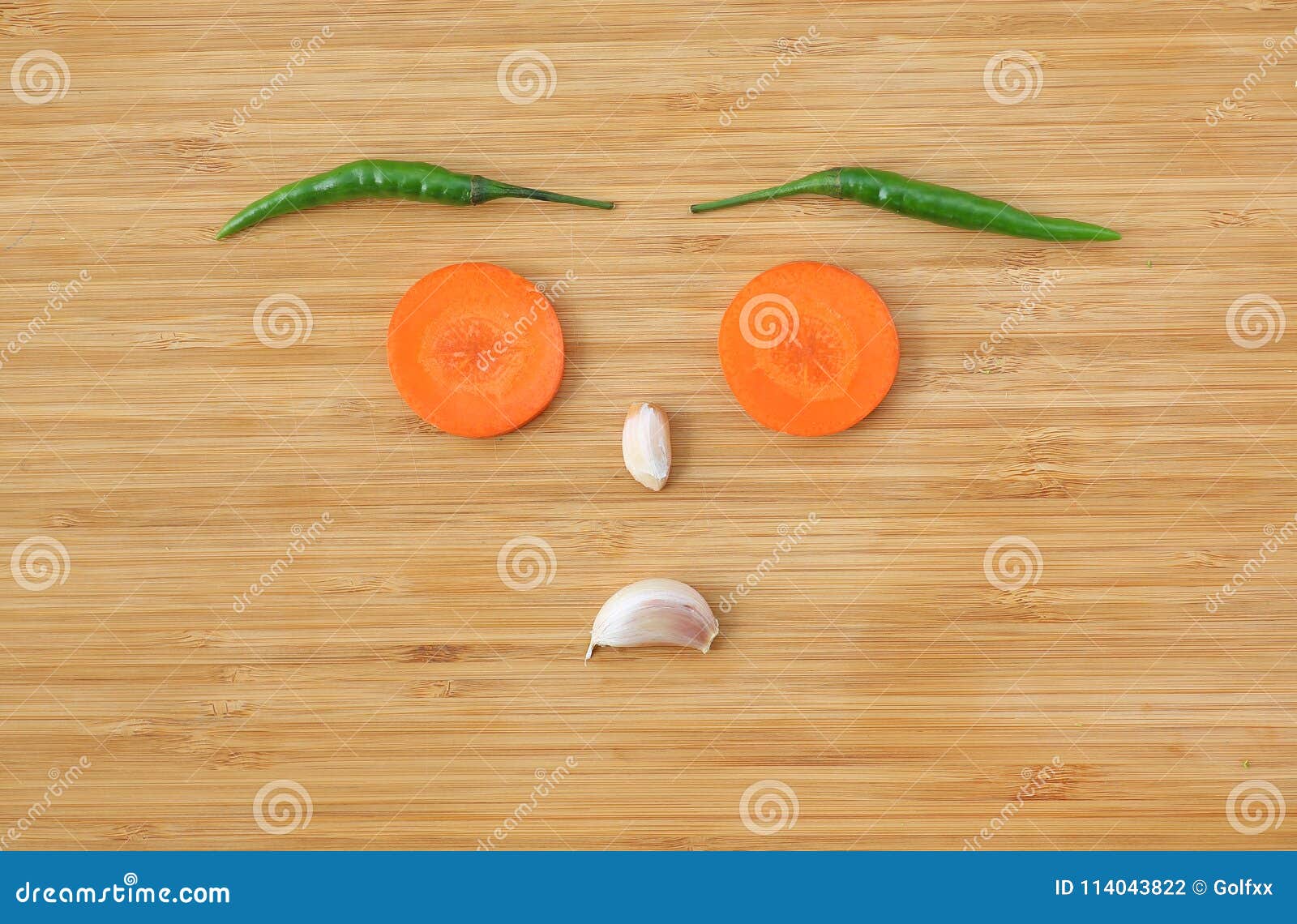 Sad Face Made of Vegetables on Wooden Block Background Stock Photo ...
