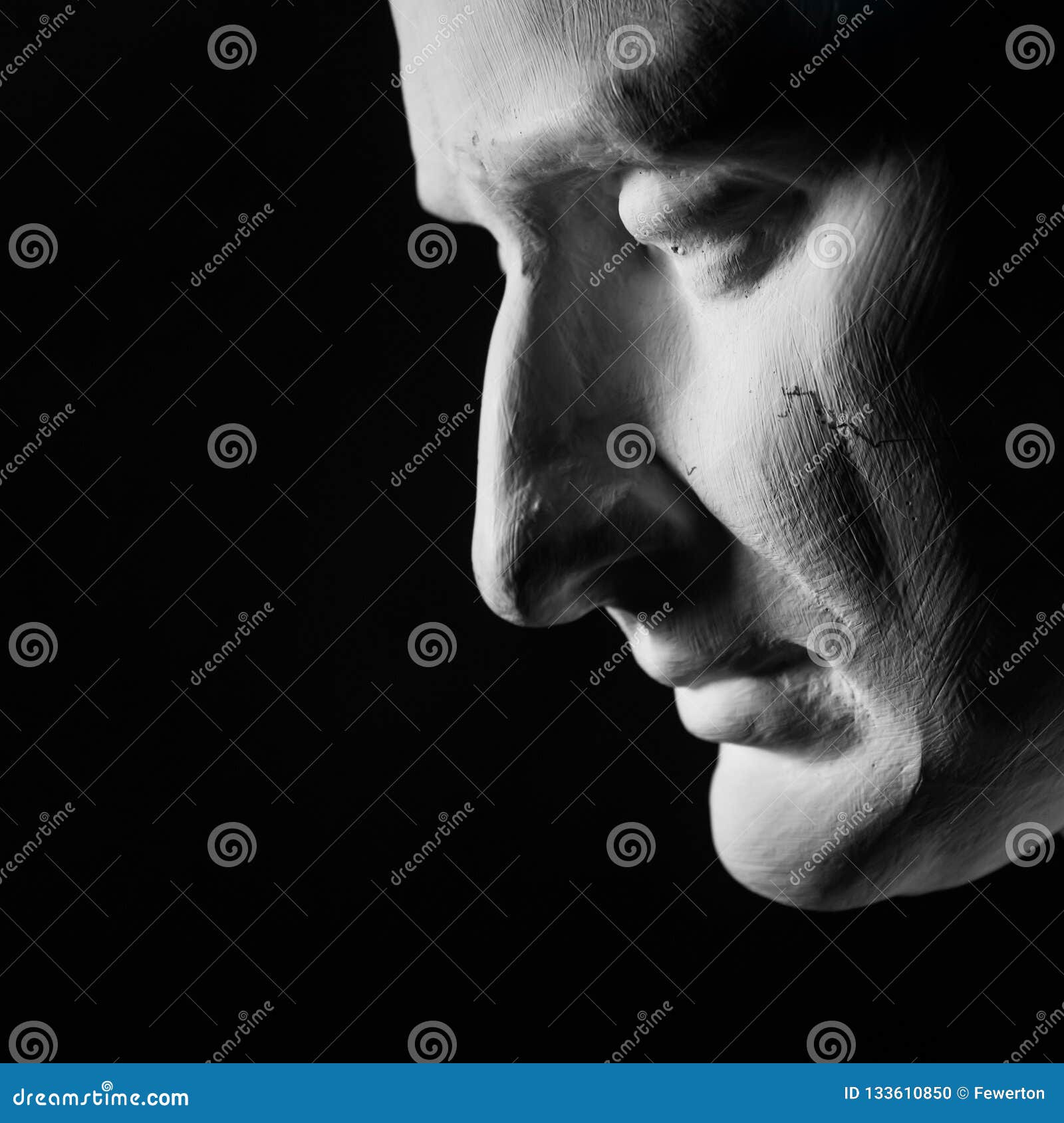 Sad Face from Plaster Human Head Profile Looking Down and in Strong ...