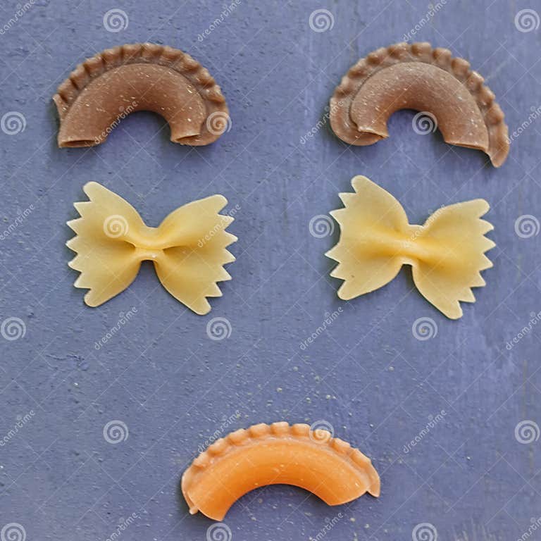Sad face with raw pasta stock image. Image of fusilli - 75861385