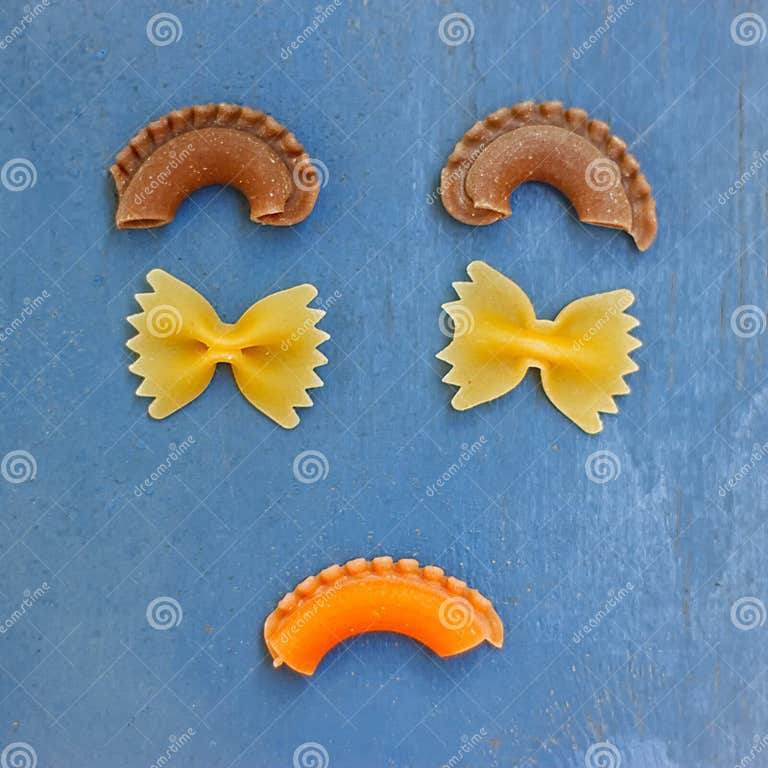 Sad face with raw pasta stock image. Image of isolated - 75861925