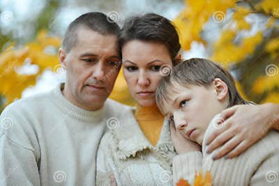 Sad family of three stock image. Image of childhood, human - 46333575
