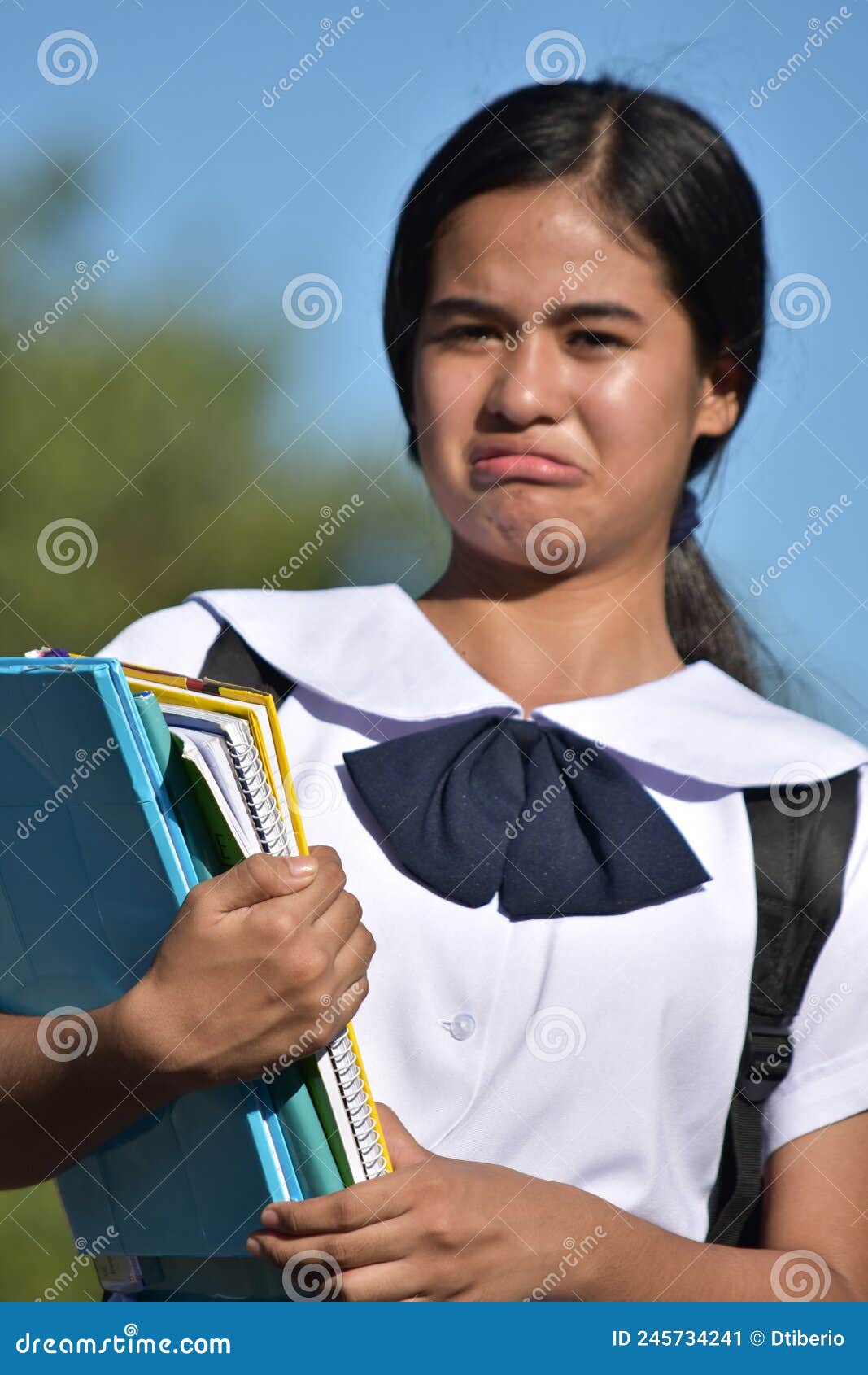 A Sad Female Student Holding Books Stock Image - Image of depressed ...