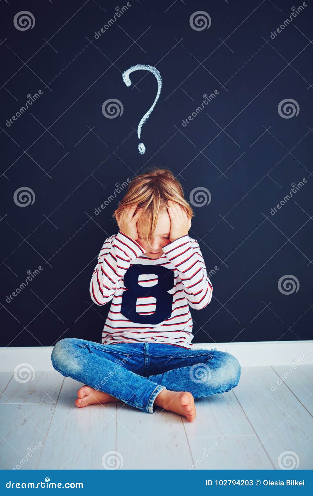 Sad, Frustrated School Boy Sitting on the Floor with Question Mark ...