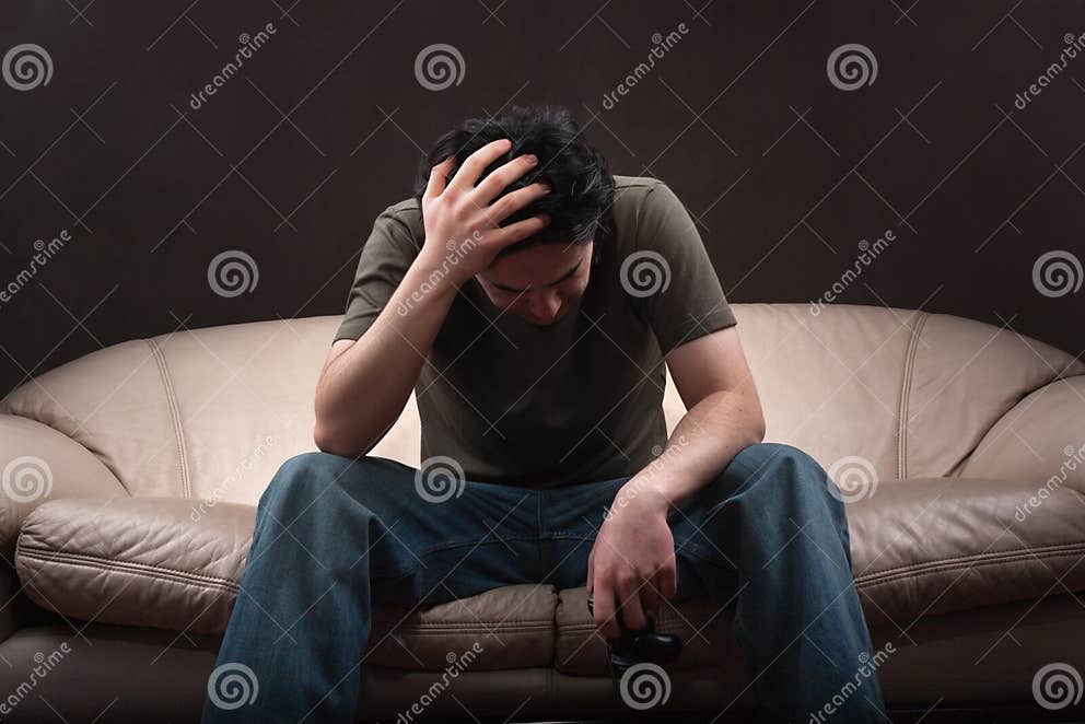 Sad gamer stock image. Image of cool, human, holding - 23719937